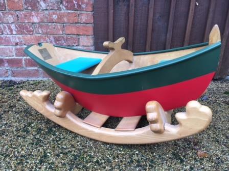 Rocking toy boat