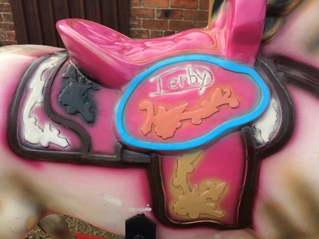 Mechanical rocking horse.